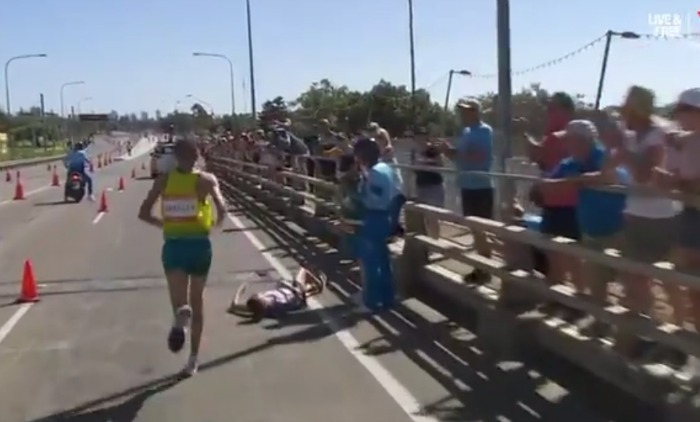 Marathon champ hit with online abuse after overtaking collapsed runner ...